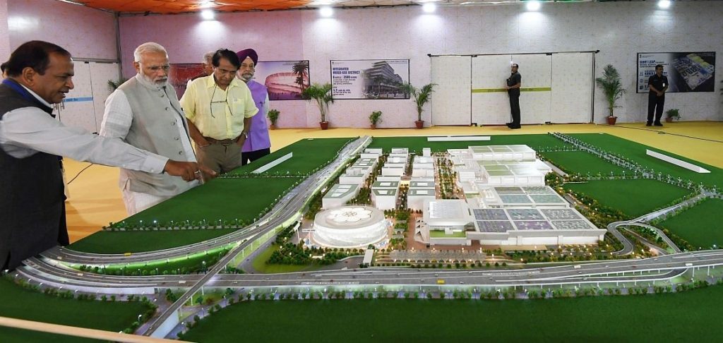 Modi lays stone for world-class convention center in Delhi - INDIA New ...